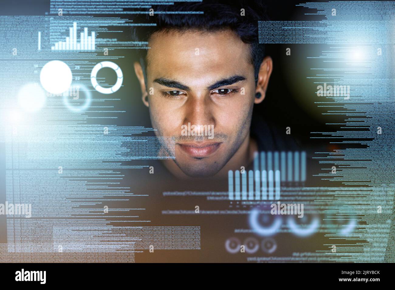 All about information. a young hacker cracking a computer code in the dark Stock Photo - Alamy