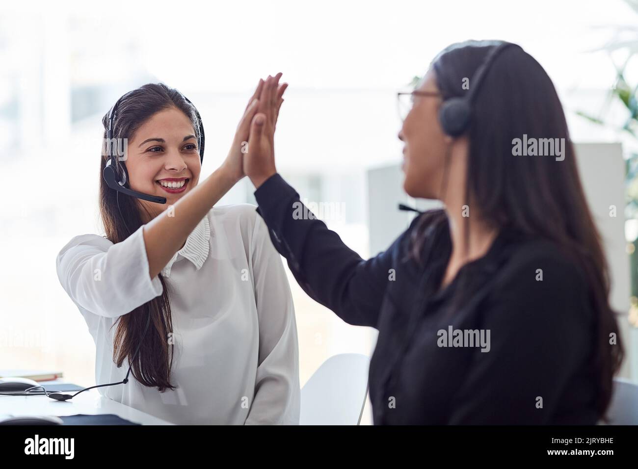 You handled that so professionally. two call centre agents giving each ...