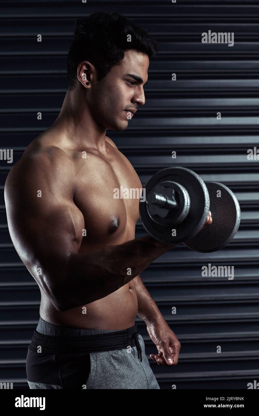 Man working out biceps dumbbell hi-res stock photography and images - Alamy