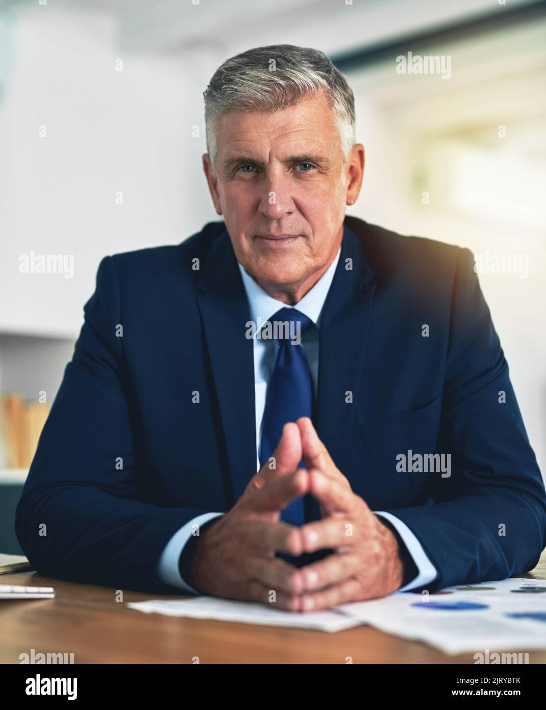 Good things come to those who work. Portrait of a confident businessman ...