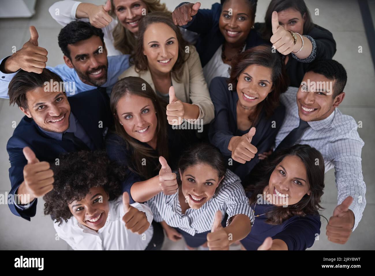 We say yes to success. High angle portrait of a group of coworkers ...