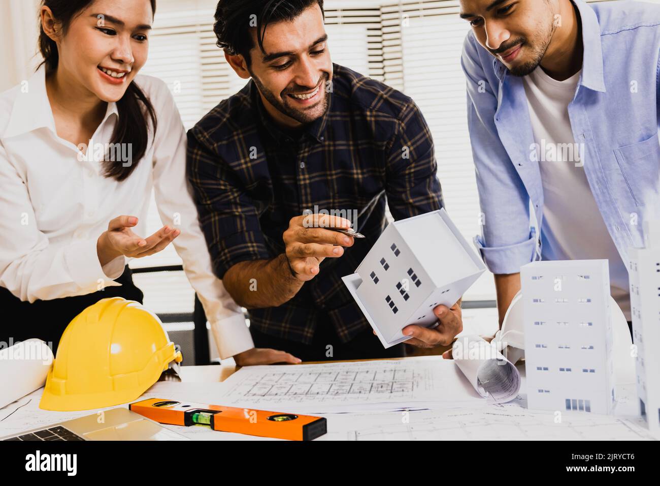 ฺBrainstorming team of architects and engineer design and build ...