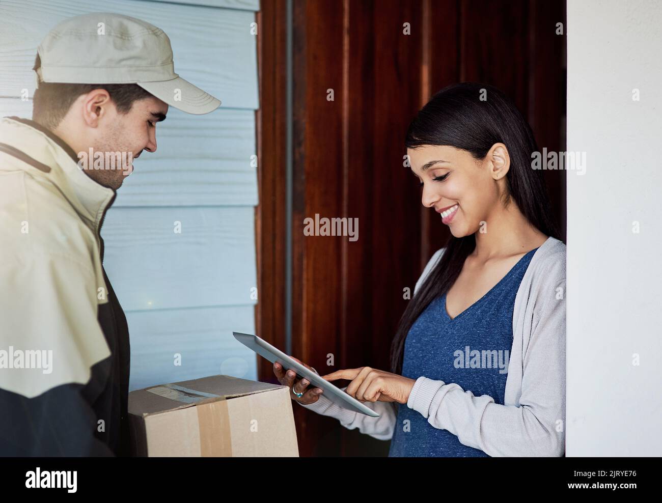 Woman using tablet efficiently hi-res stock photography and images - Alamy