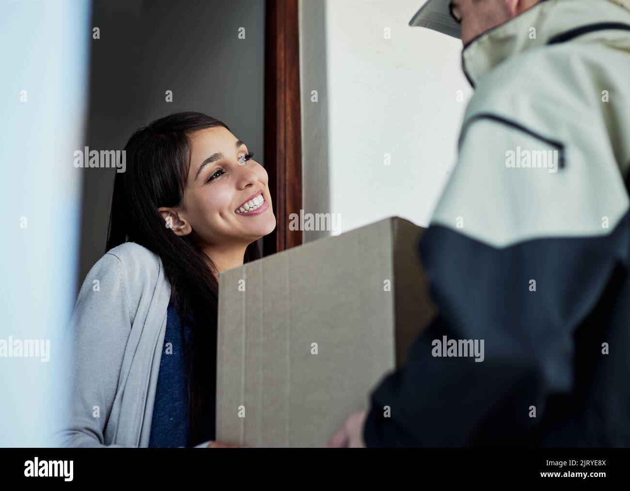 Thank you so much for the swift delivery. a young woman receiving her ...