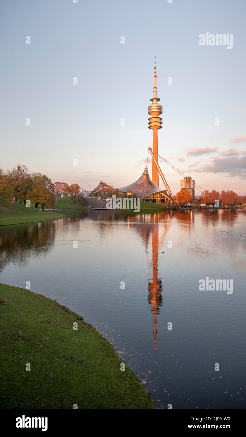 Olympic Tower and Olympic Stadium at sunset, reflection in the Olympic ...