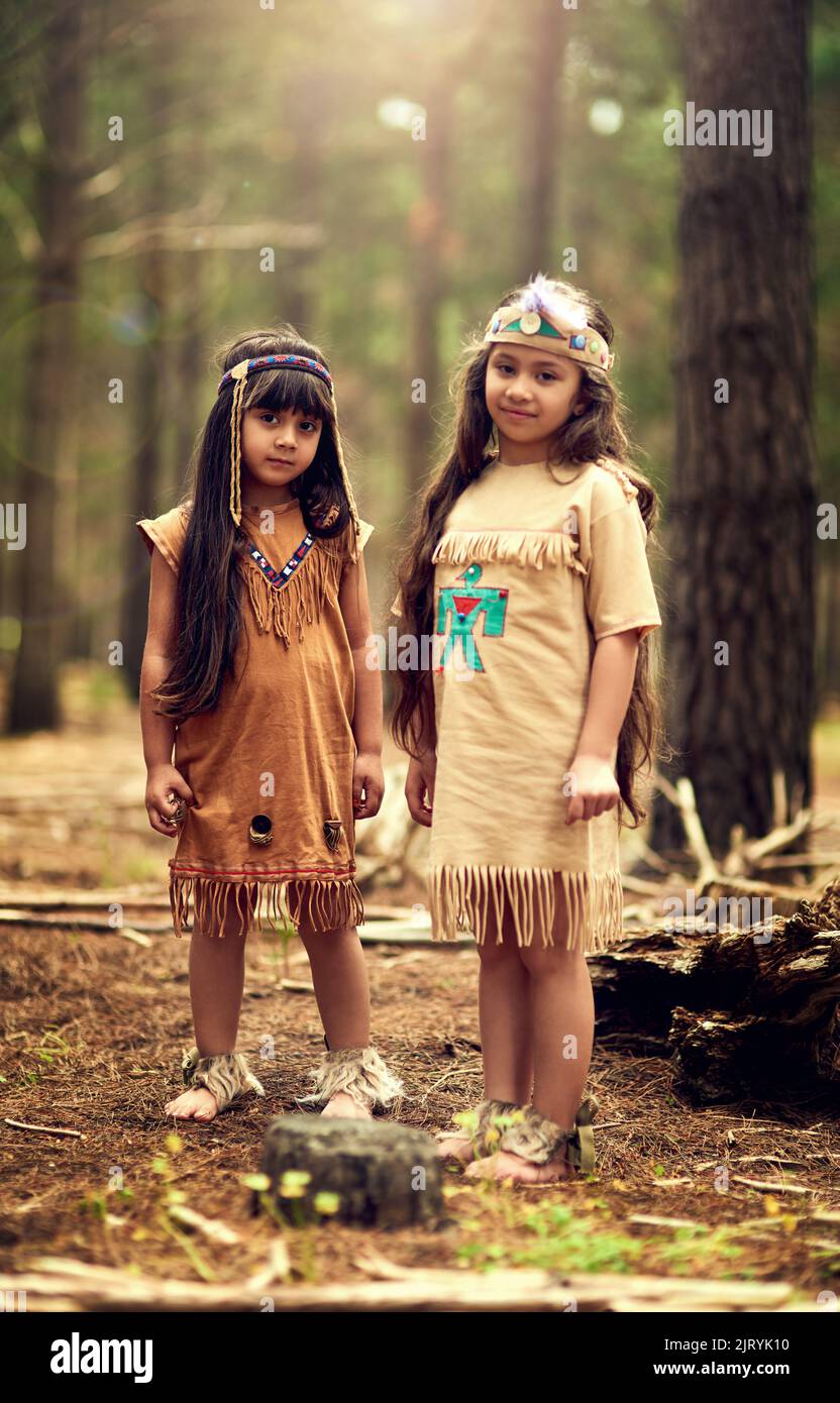 Were Indians for the day. Full length portrait of two little girls ...