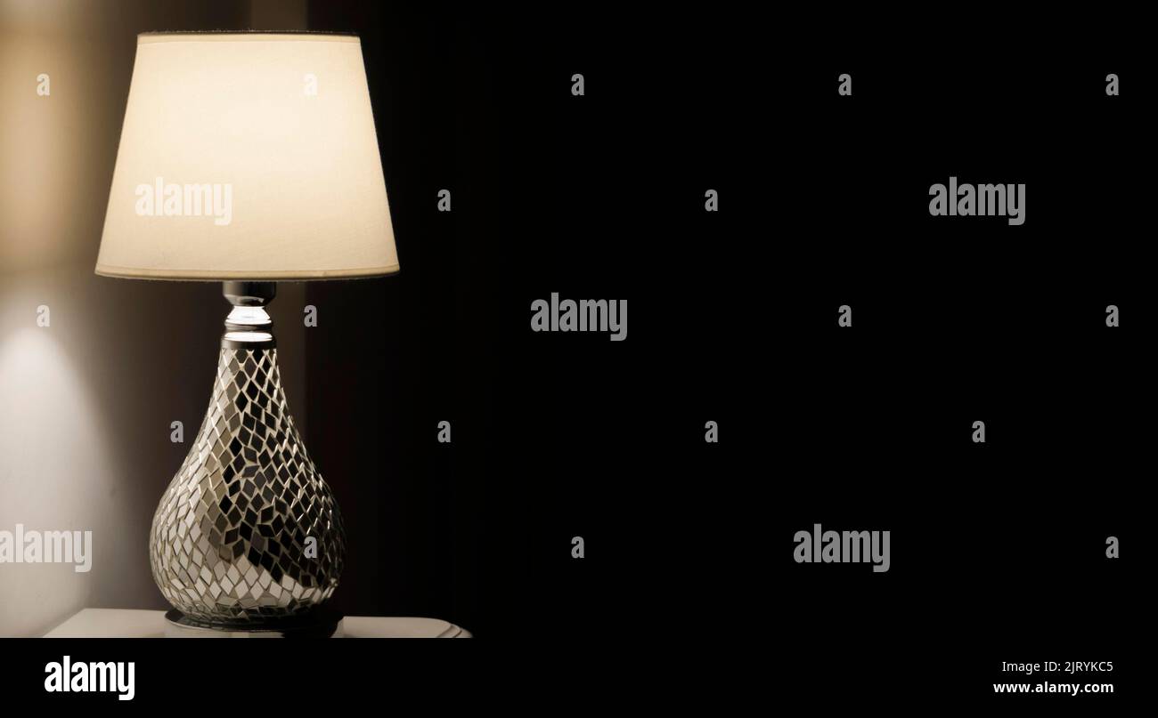 Modern illuminated lamp inside a house Stock Photo - Alamy