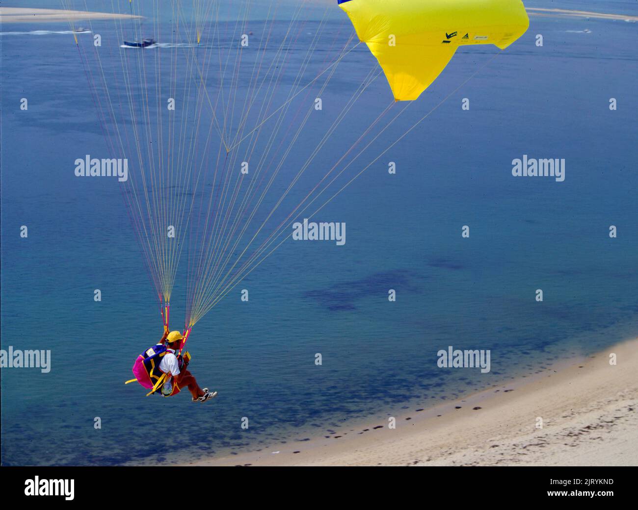 Paraglider on landing Stock Photo - Alamy