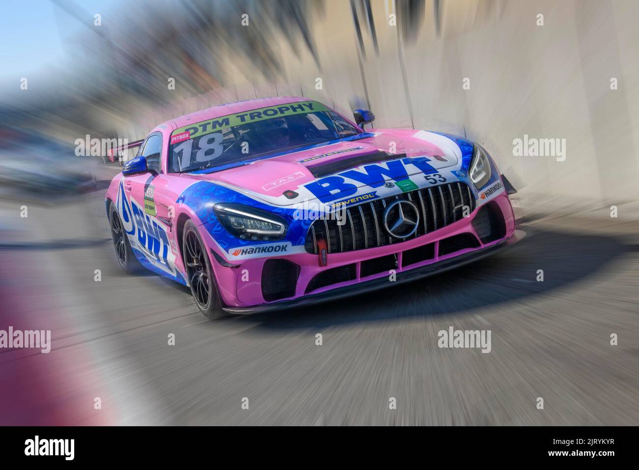 Dynamic photo with zoom effect of Mercedes AMG GT3 sports car racing ...