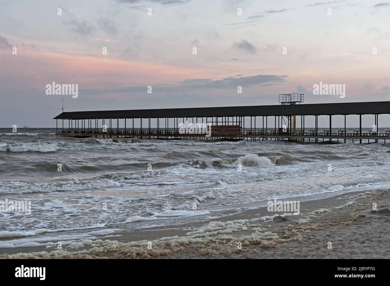 Side view of the empty simple covered pier of Koblevo in Ukraine with ...