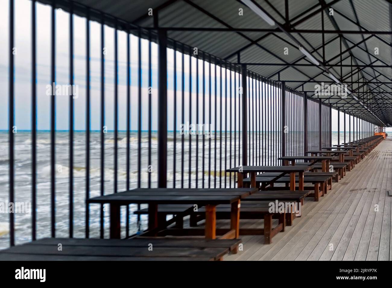 Side view of the empty simple covered pier of Koblevo in Ukraine with ...