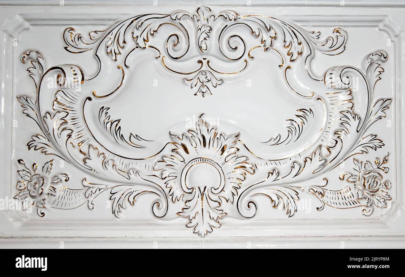 White ceramic tile with golden pattern Stock Photo - Alamy