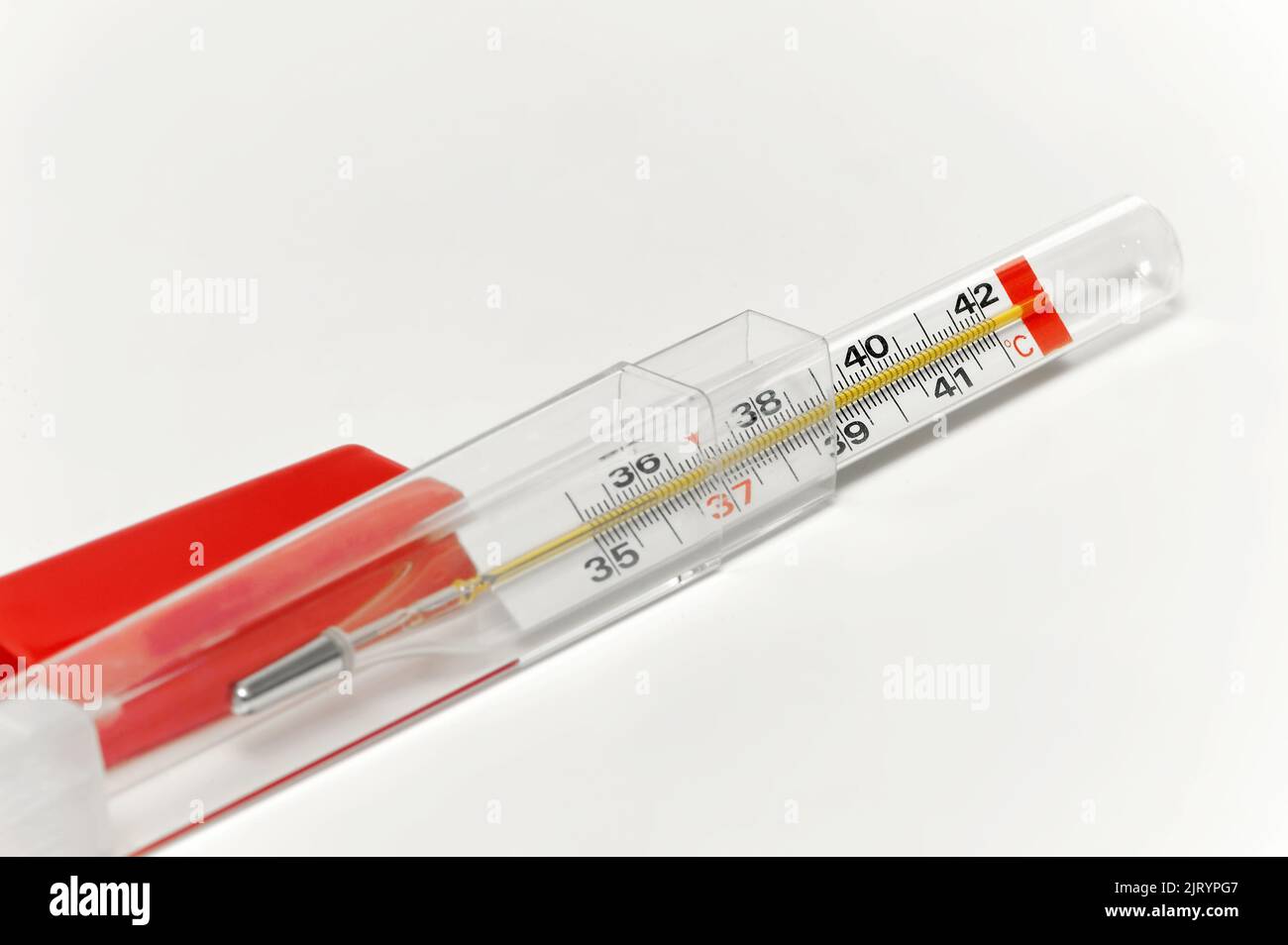 Closeup to a medical mercury-in-glass maximum thermometer in a box ...