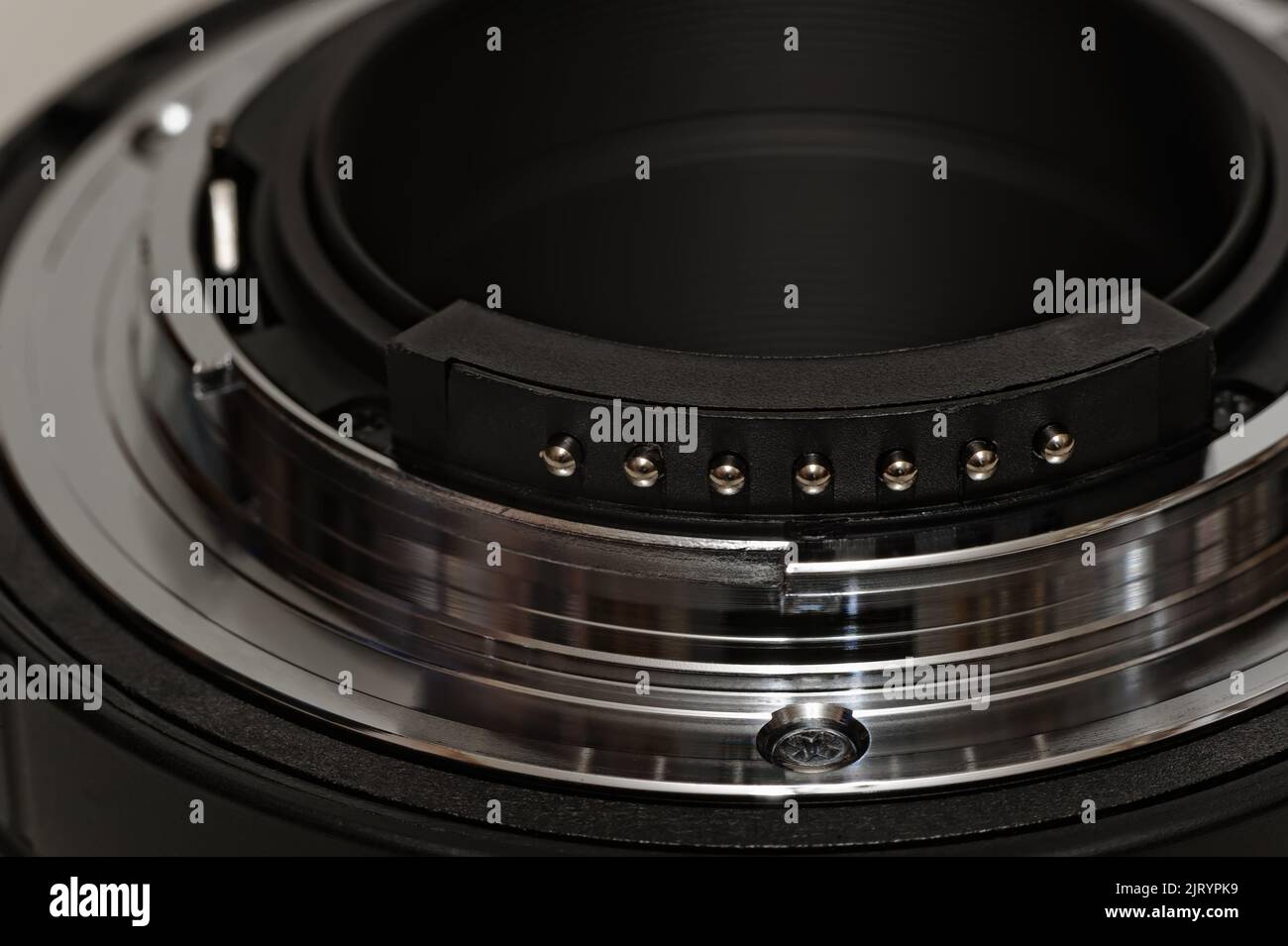 The flange of a current F-mount bayonet lens, including aperture lever ...