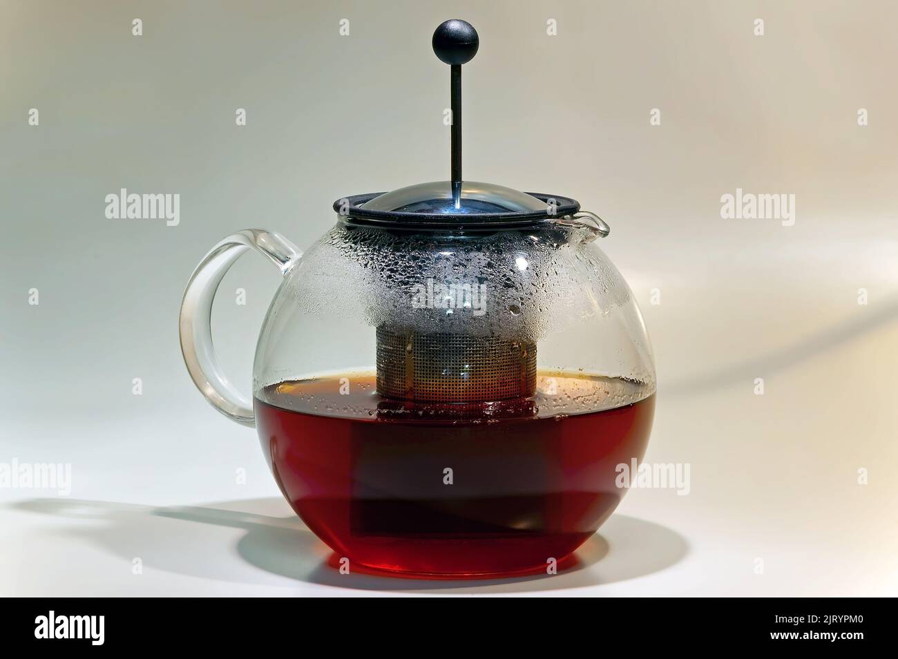 French press glass brewing teapot with black tea Stock Photo - Alamy