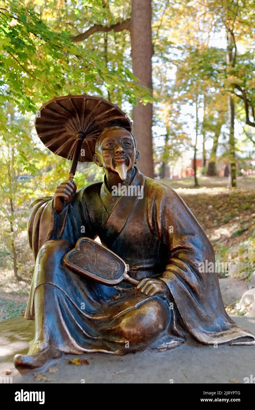 Sculpture of Chinese wise man near the Chinese Bridge in Arboretum ...