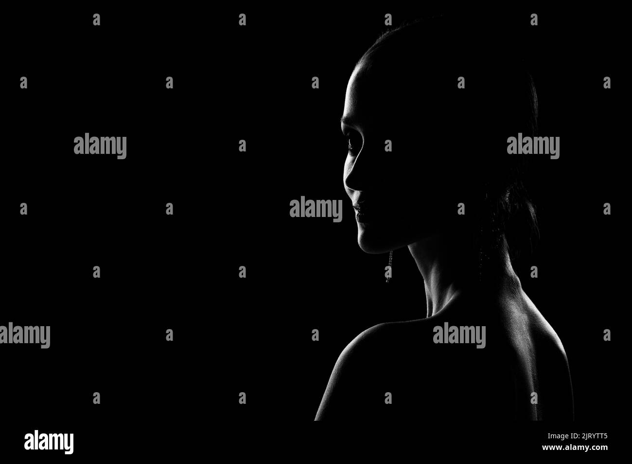 beautiful woman profile silhouette on back background with copy space ...