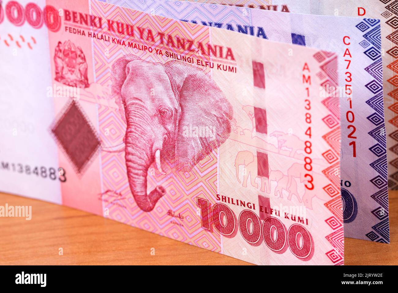 Tanzanian money - Shilling a business background Stock Photo - Alamy
