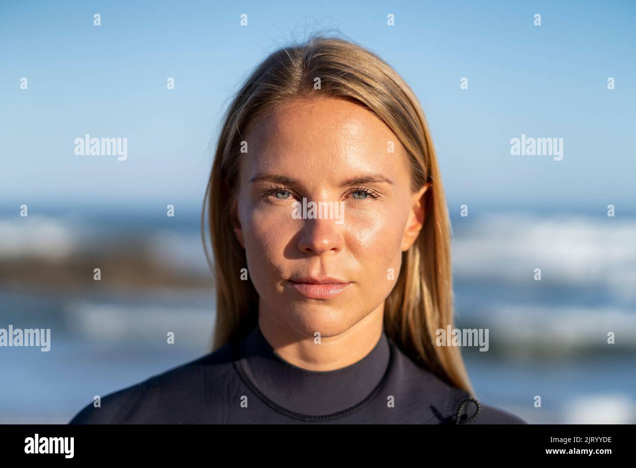 Girl surf wetsuit hi-res stock photography and images - Alamy