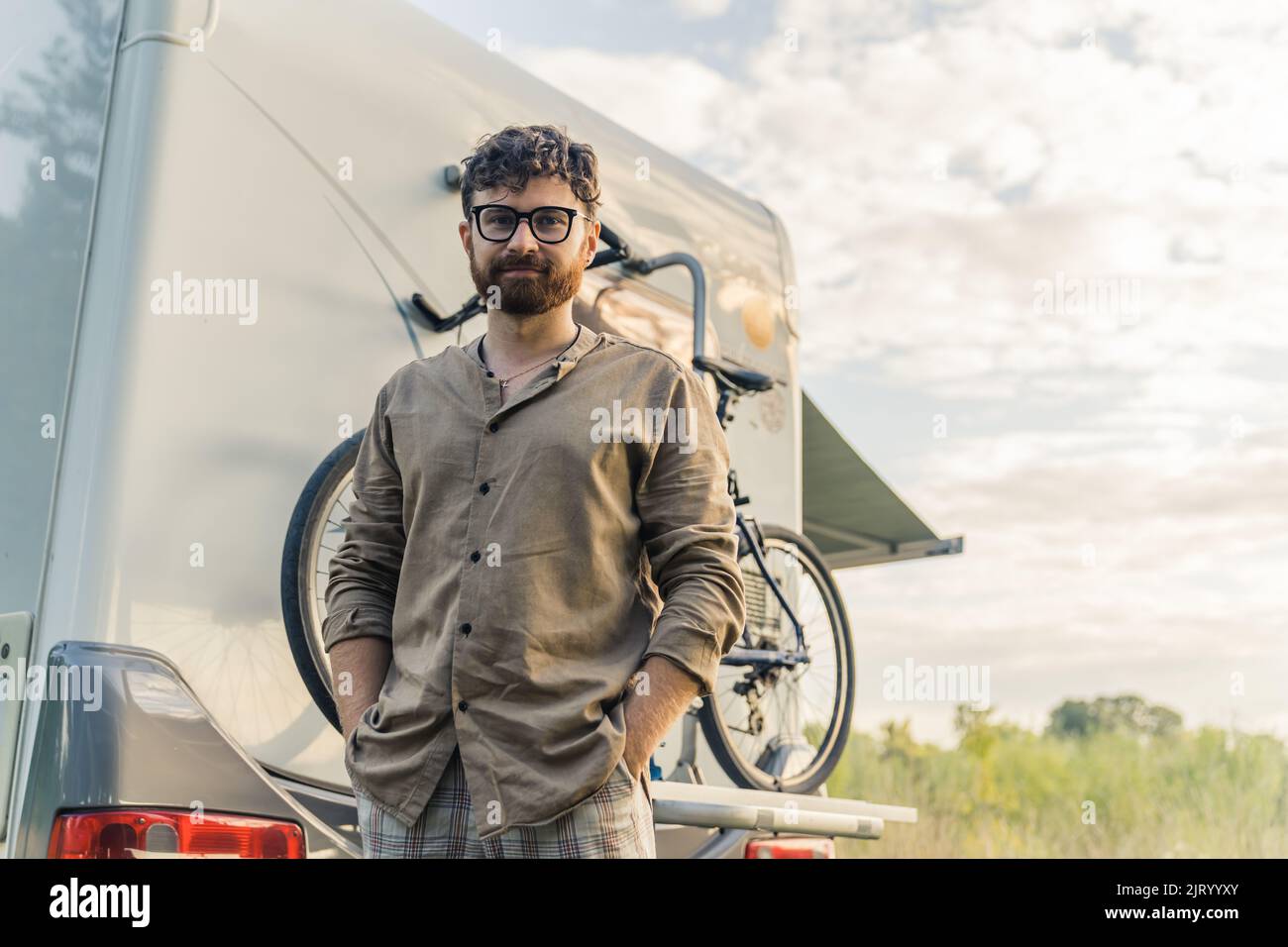 Man standing behind car hi-res stock photography and images - Alamy