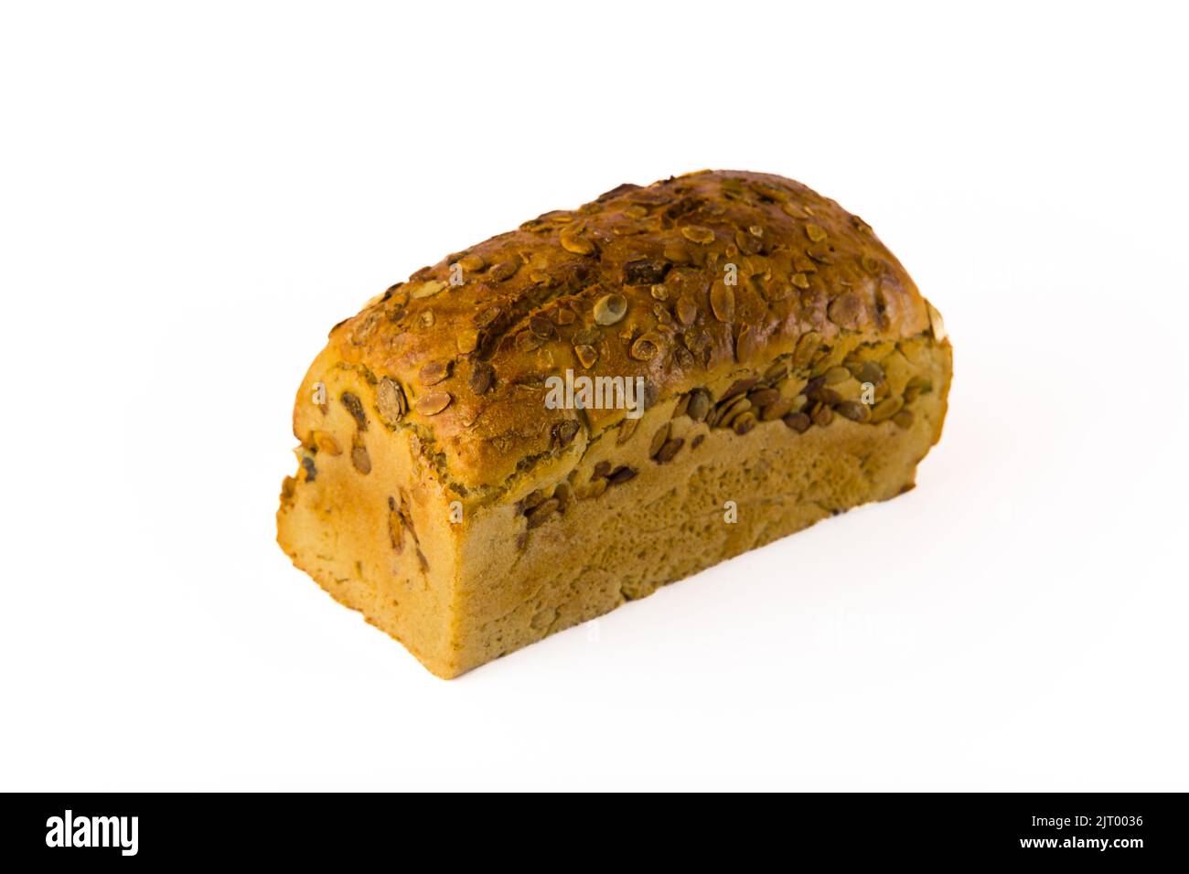 Crunchy loaf of nutritious while wheat bread with pumpkin seeds ...