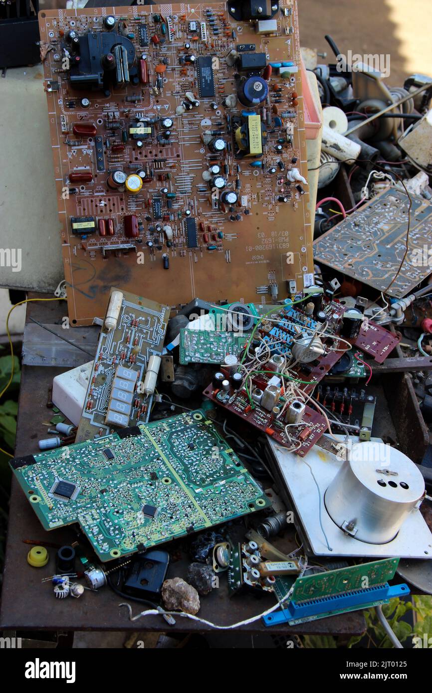 Background with old rare electronic components randomly decomposed ...
