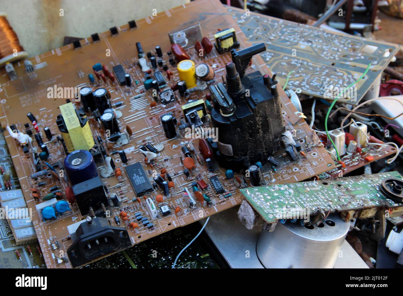Background with old rare electronic components randomly decomposed ...