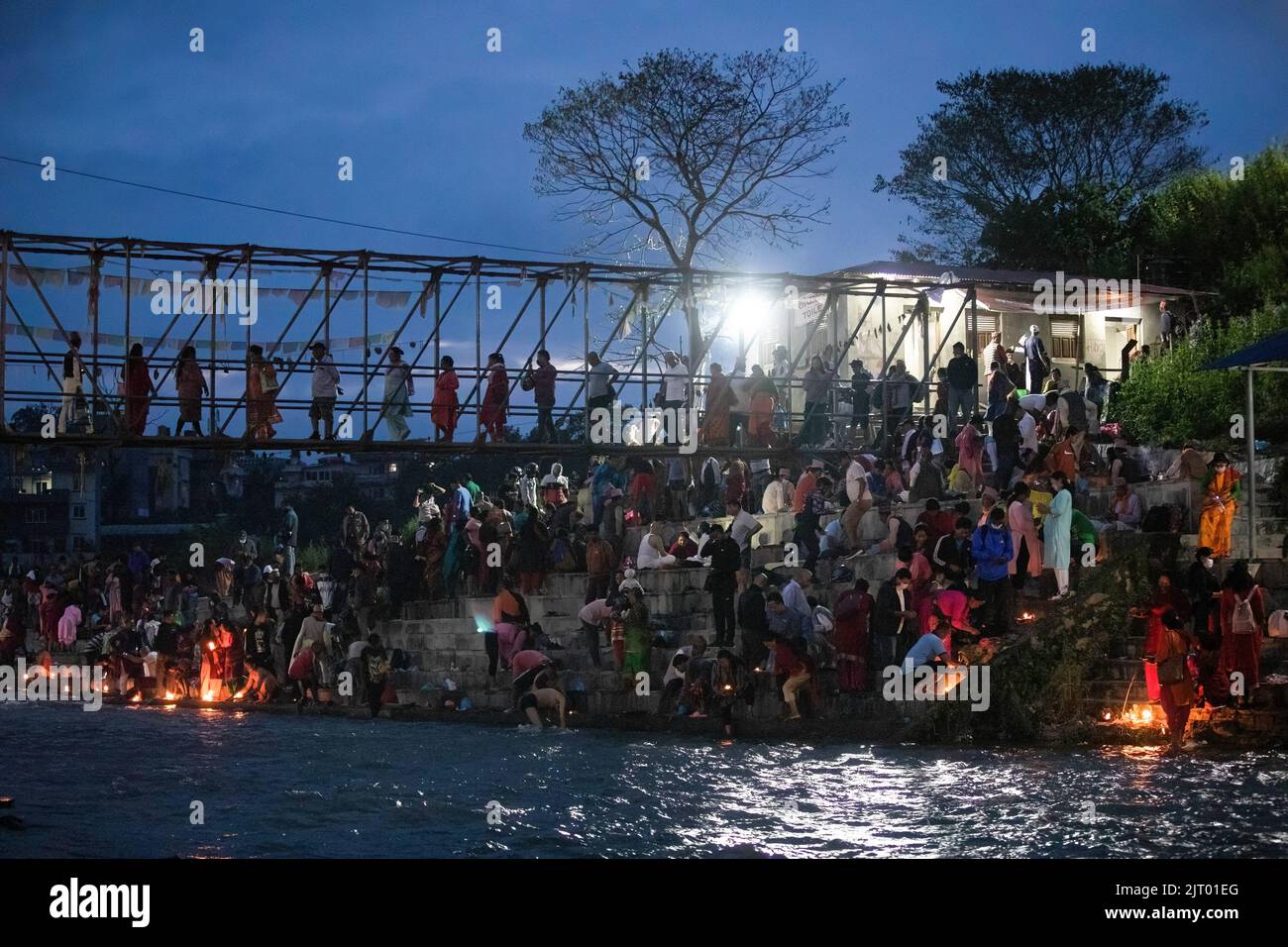 Kathmandu, Nepal. 27th Aug, 2022. Nepalese devotees perform rituals ...