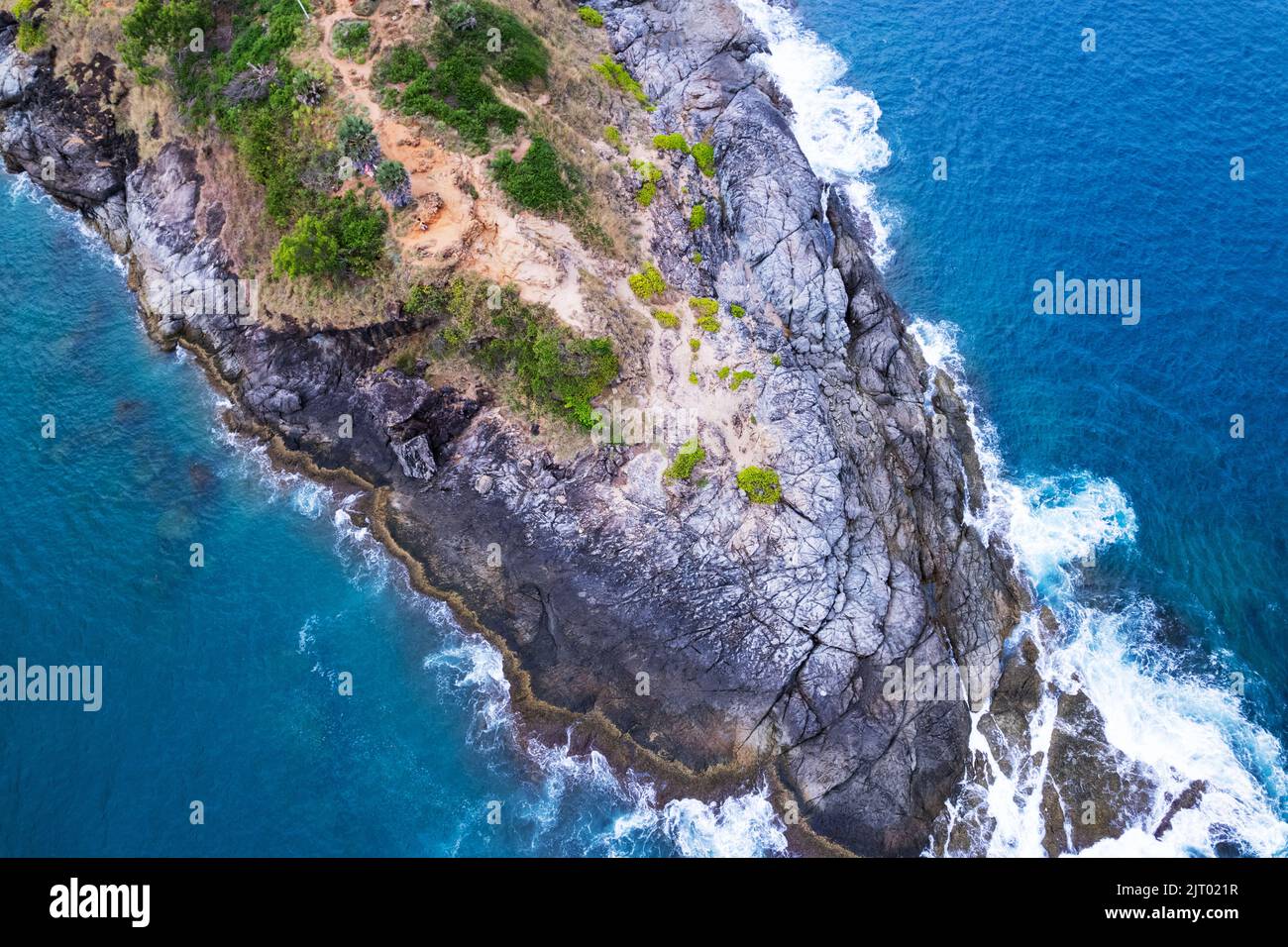 Aerial view Top down seashore big wave crashing on rock cliff Beautiful ...
