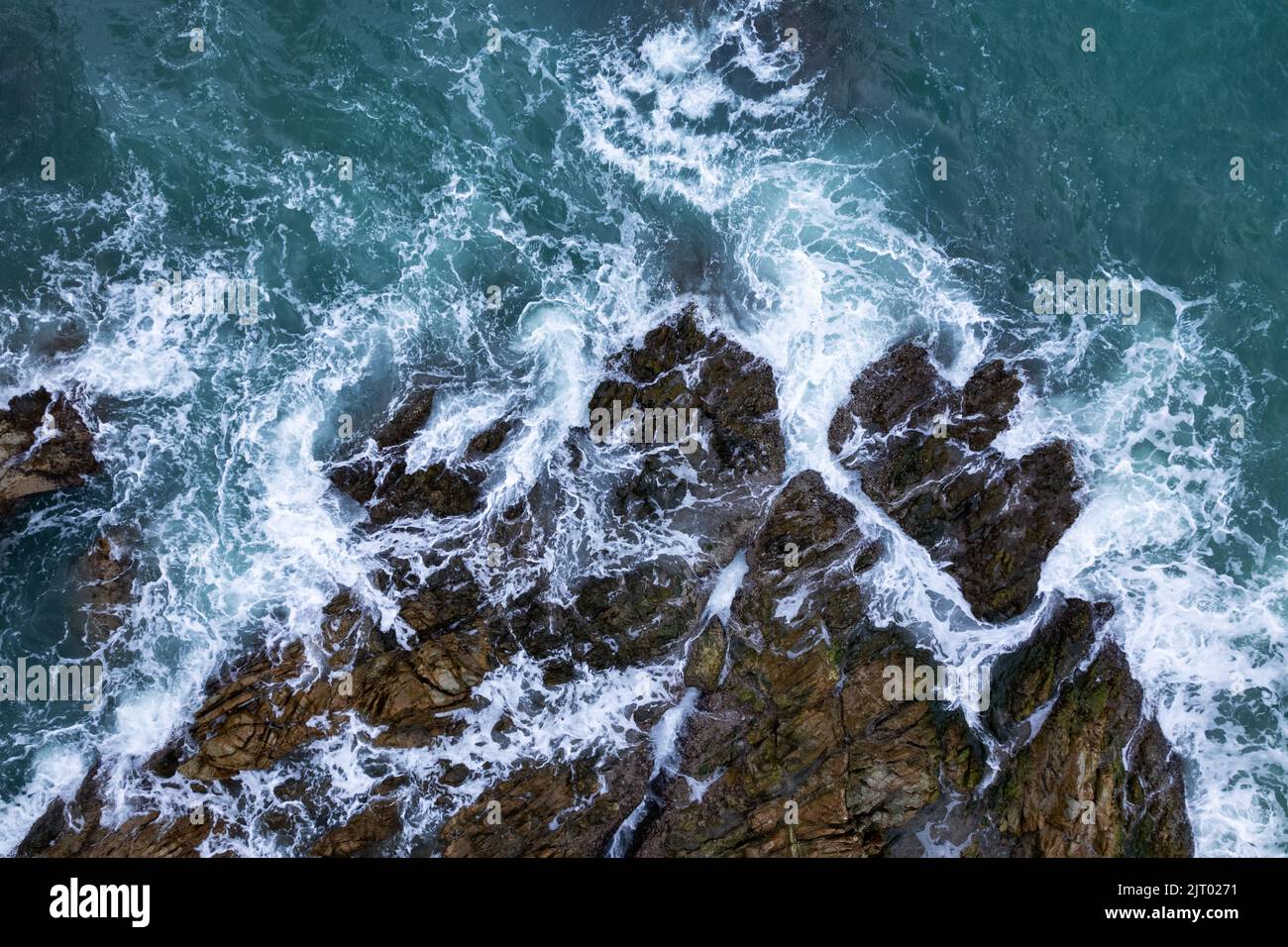 Aerial view Top down seashore big wave crashing on rock cliff Beautiful ...