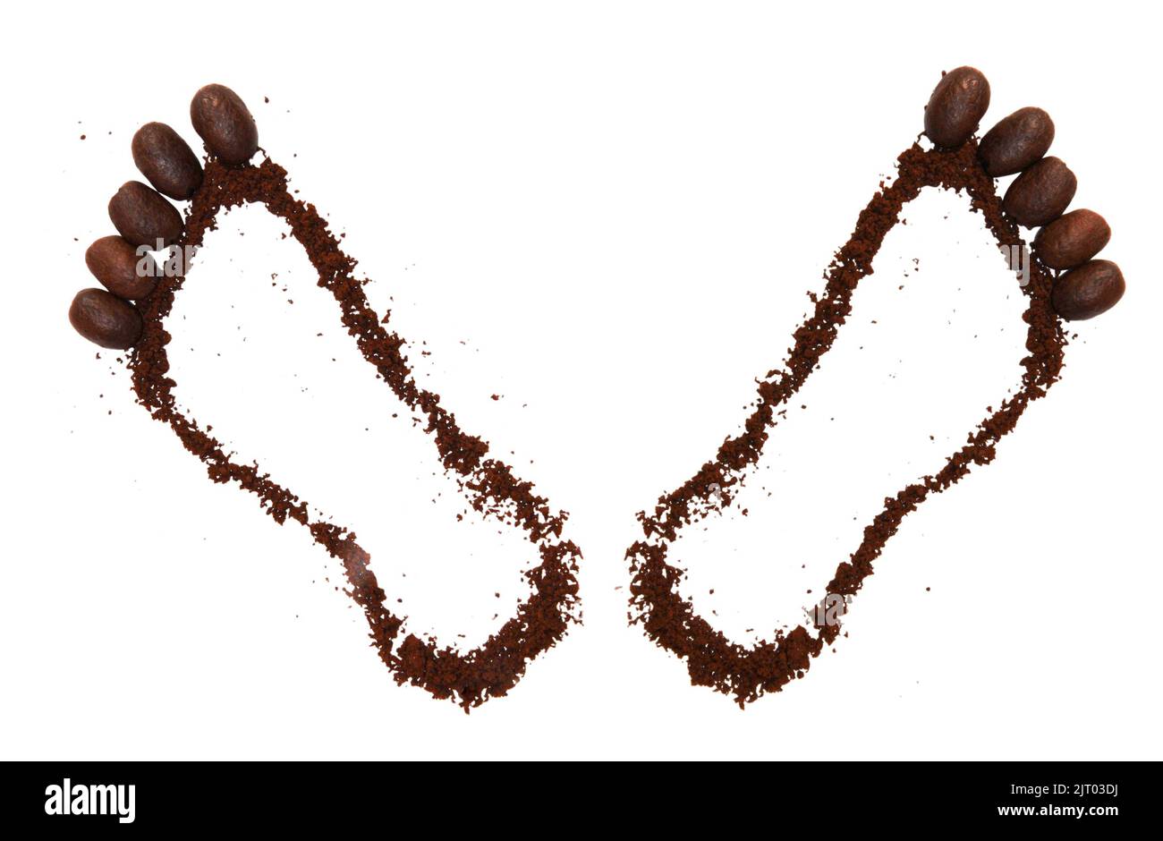 foot lined with grains of ground and instant coffee isolated on white ...