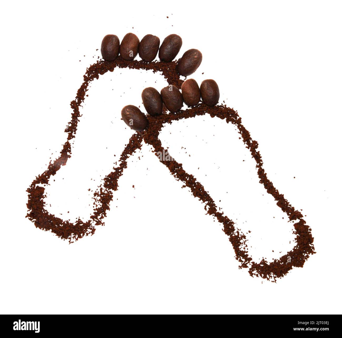 foot lined with grains of ground and instant coffee isolated on white ...