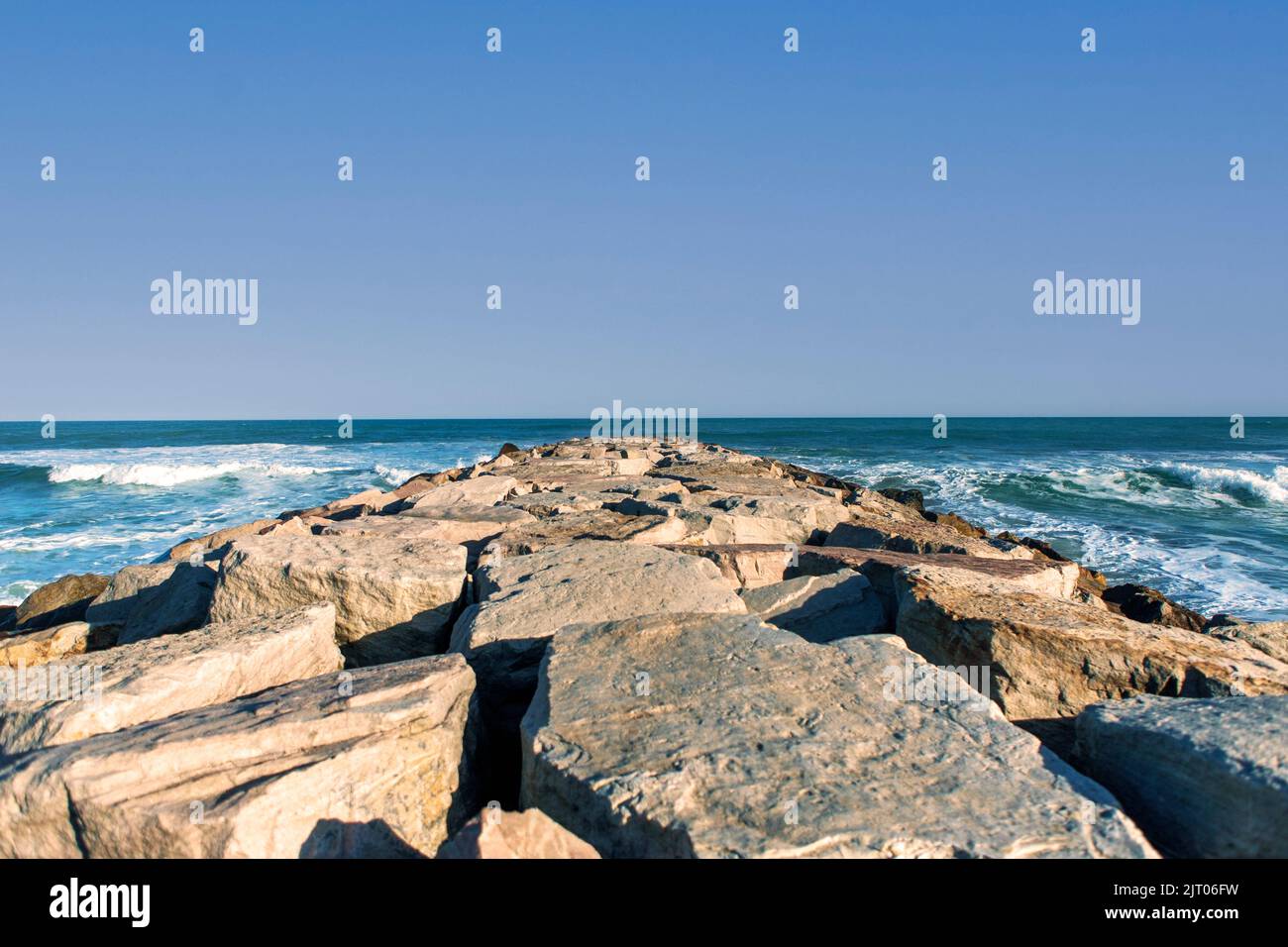 Rock breakwater hi-res stock photography and images - Alamy