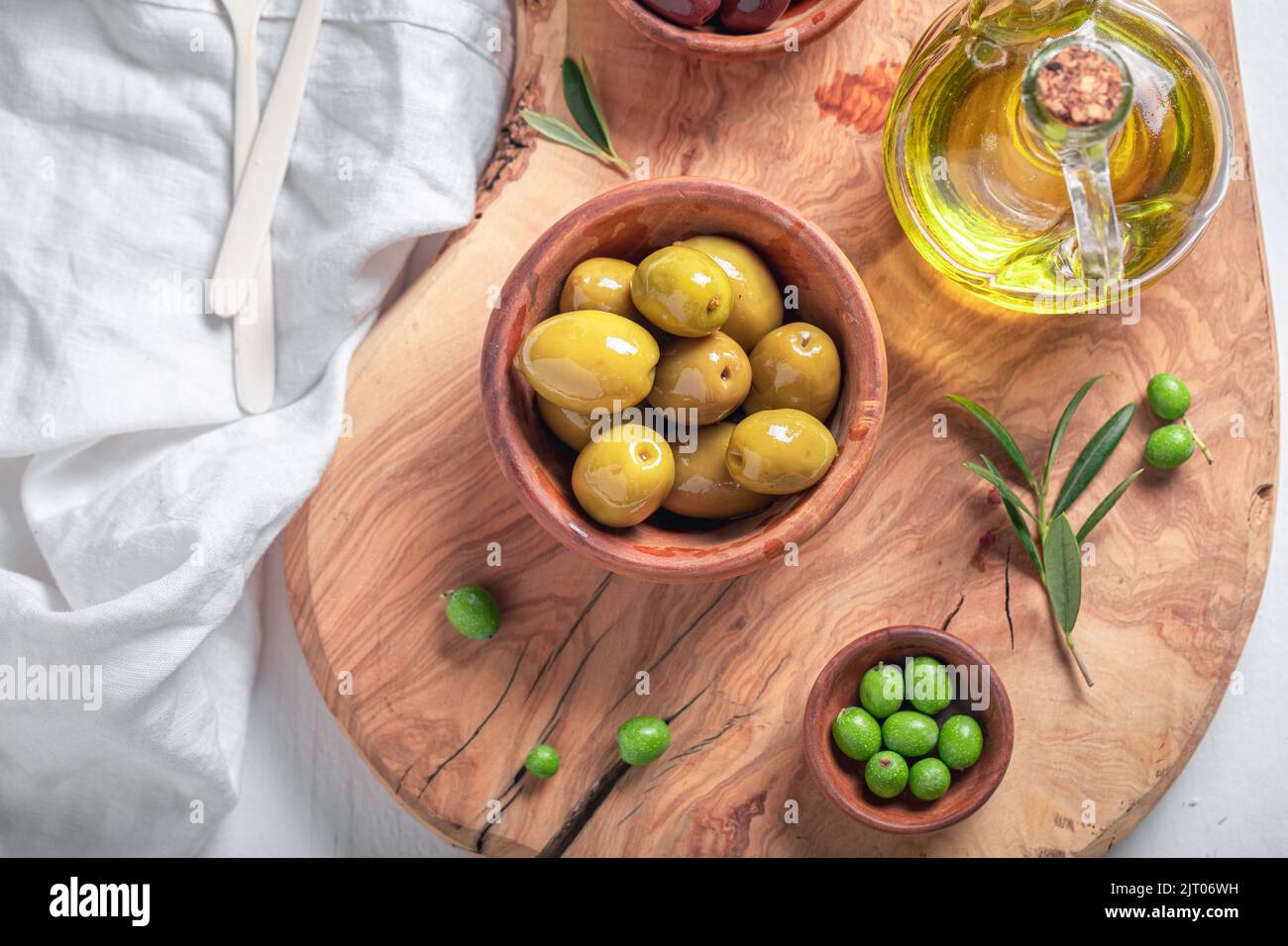 Healthy olives and extra virgin olive oil as Spanish side dish.. Set of ...