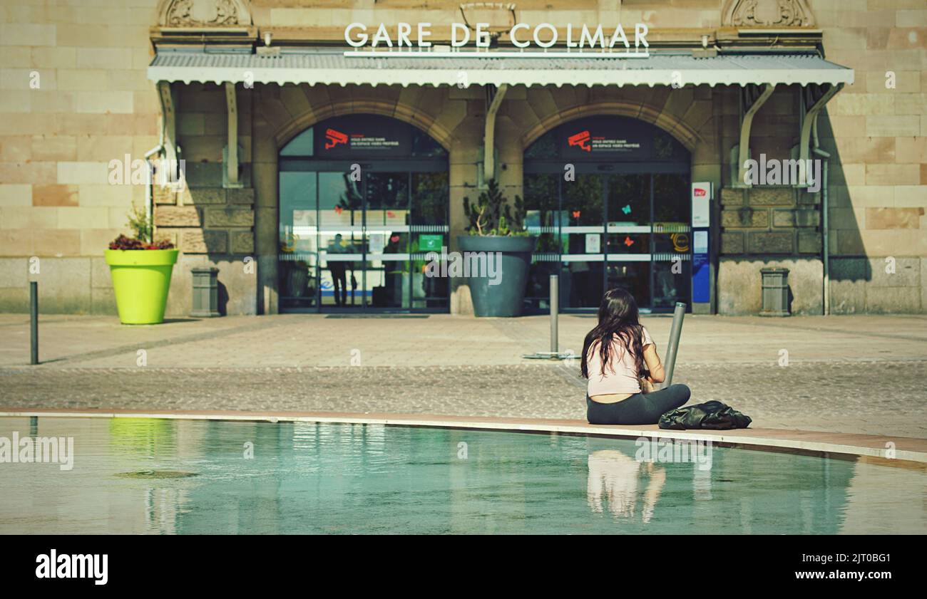 Girl sitting alone in train hi-res stock photography and images - Alamy