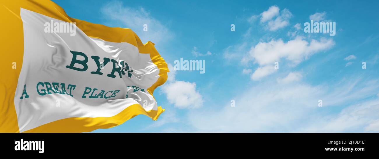 official flag of Byron, Wyoming untied states of America at cloudy sky ...