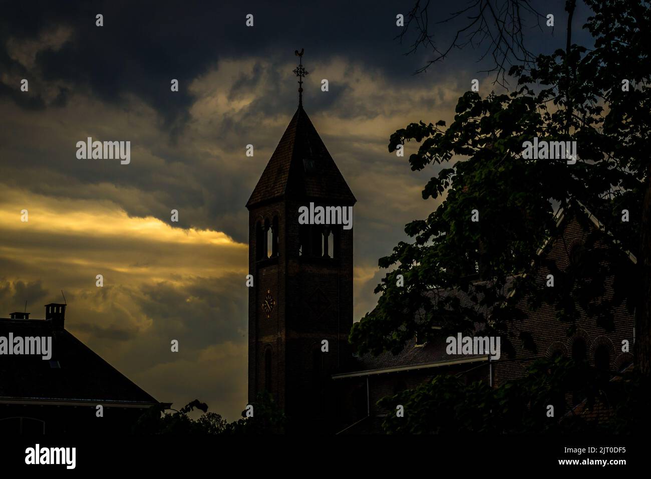 scary church with dark cloudy sky Stock Photo - Alamy
