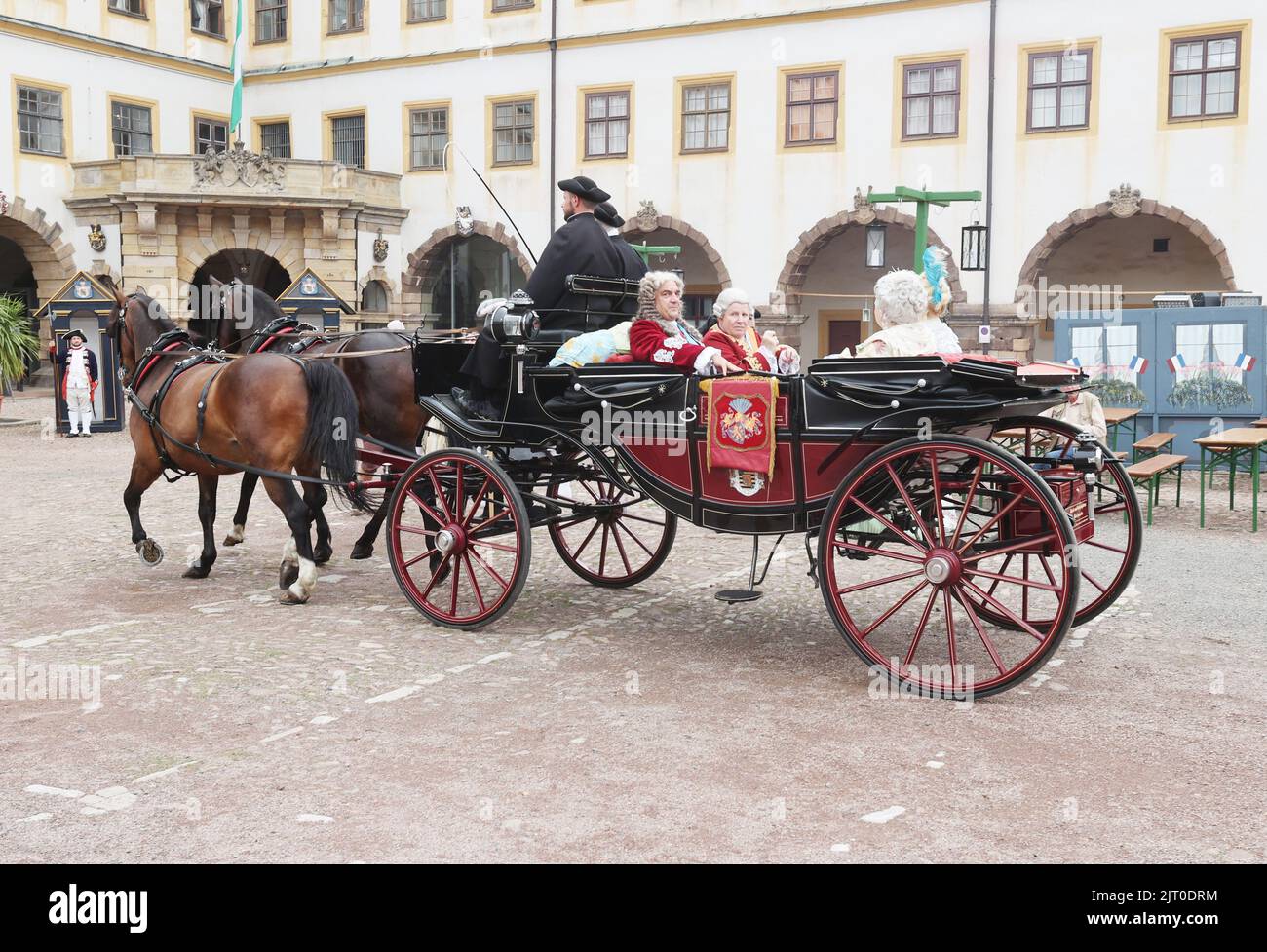 Gotha, Germany. 27th Aug, 2022. Performers in historical costumes ride ...