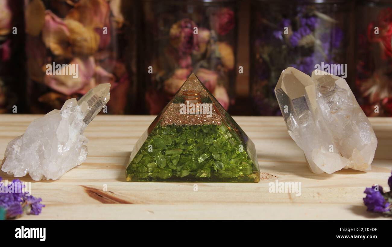 Quartz Crystals and Stone Pyramid With Flower. Relaxation and ...