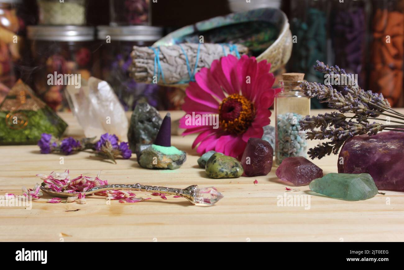 Dried Flowers And Crystal Chakra Stones On Meditation Altar Shallow Dof