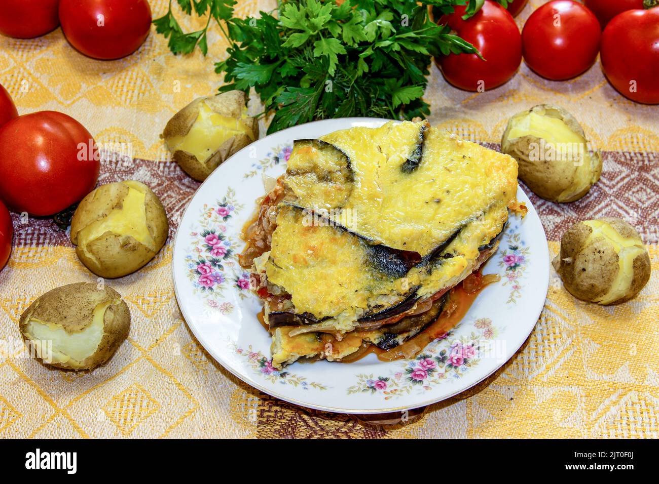 moussaka served on a porcelain plate Moussaka - a traditional Greek ...