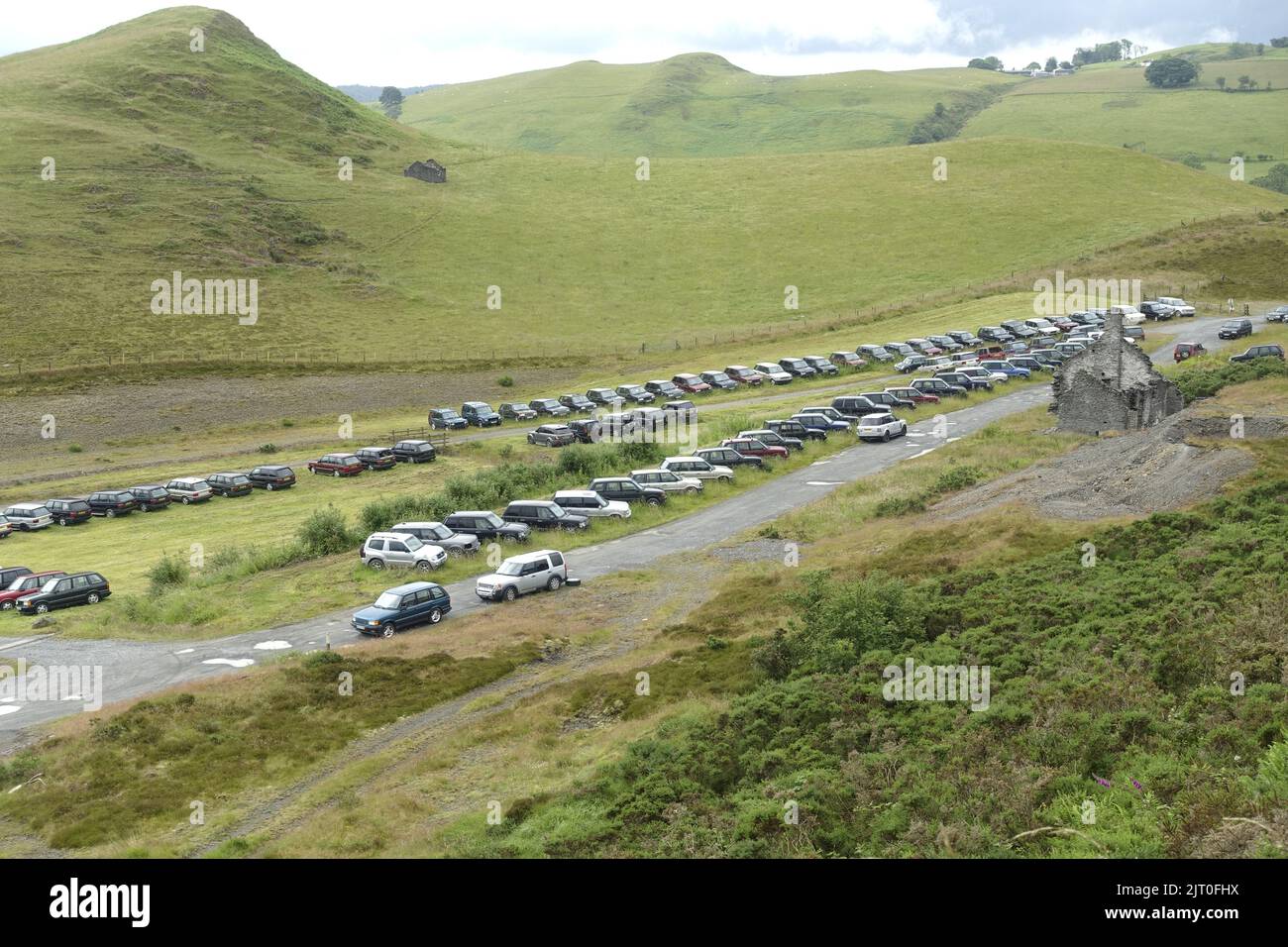 Large numbers of used Range Rovers on recycling site in remote ...