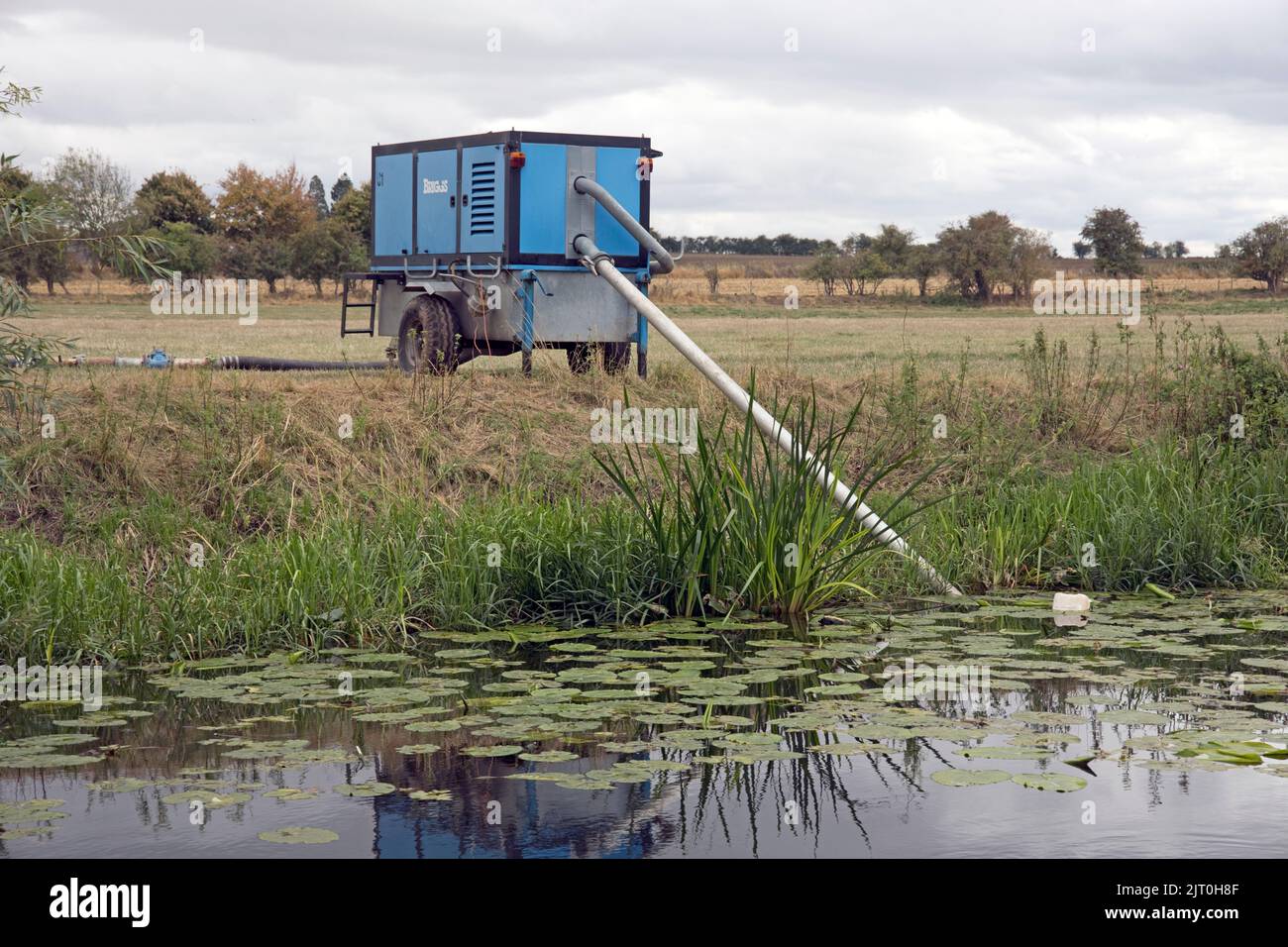 Pump on river bank extracting water from River Avon for irrigation UK ...