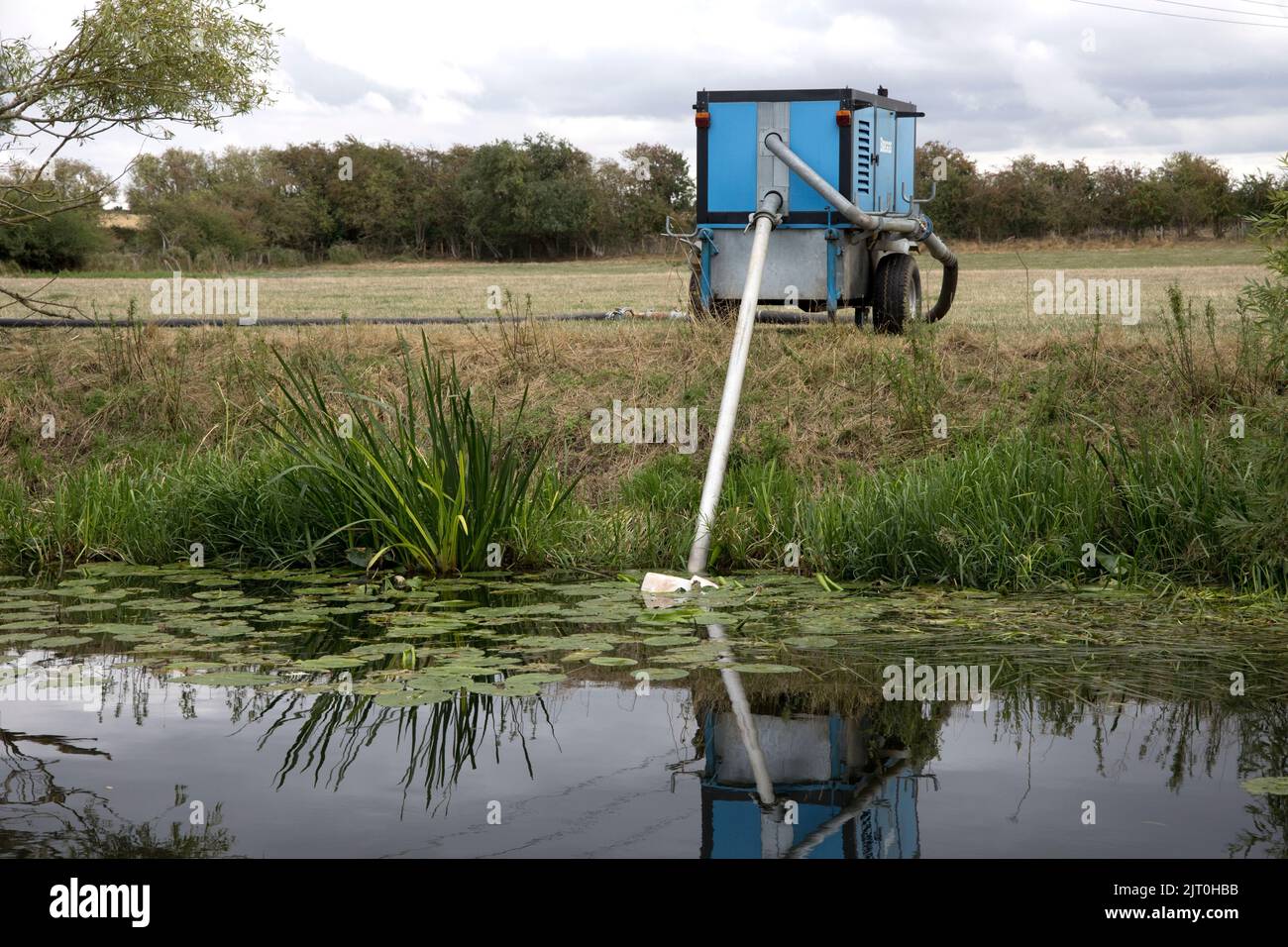 Pump on river bank extracting water from River Avon for irrigation UK ...