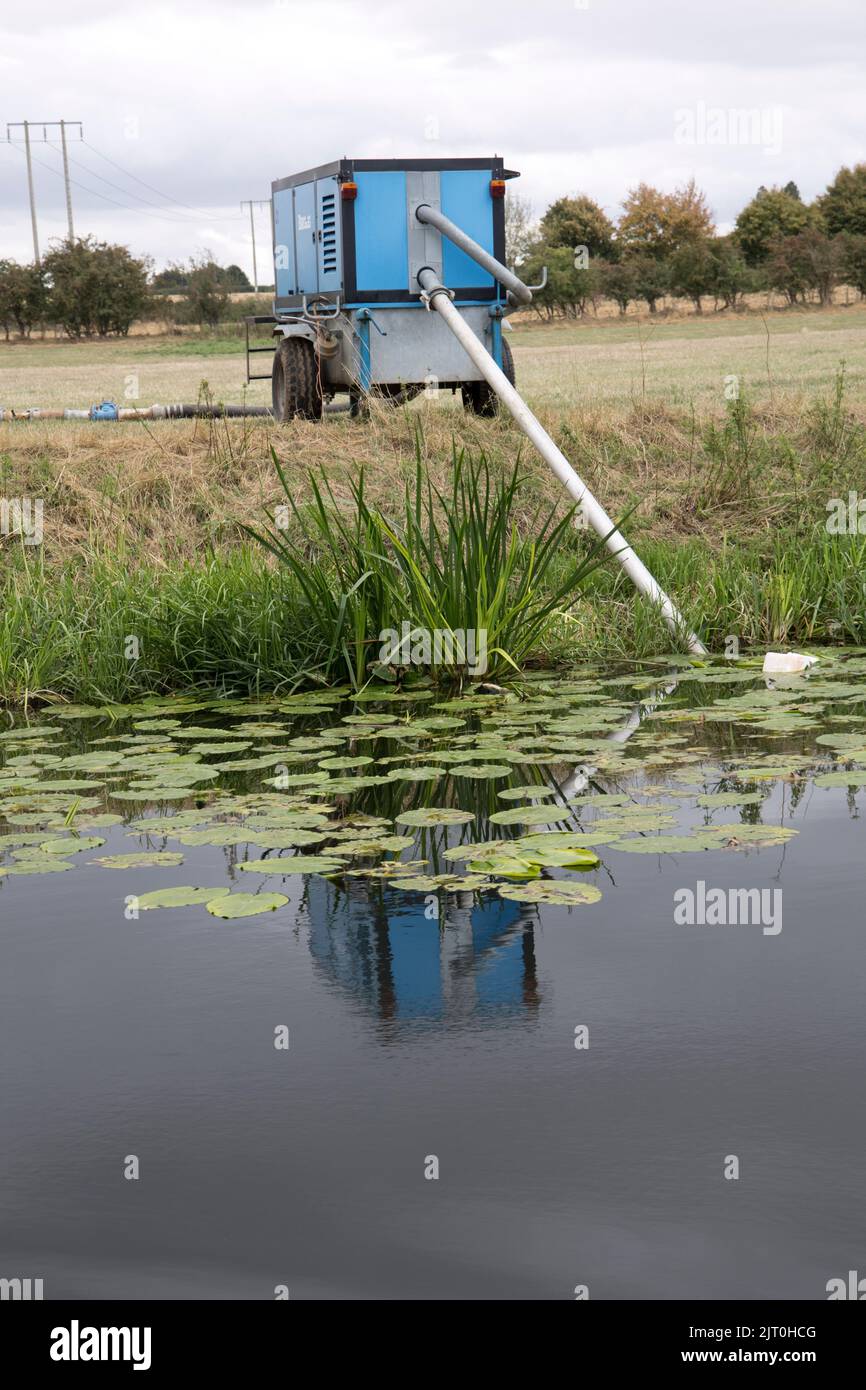 Pump on river bank extracting water from River Avon for irrigation UK ...