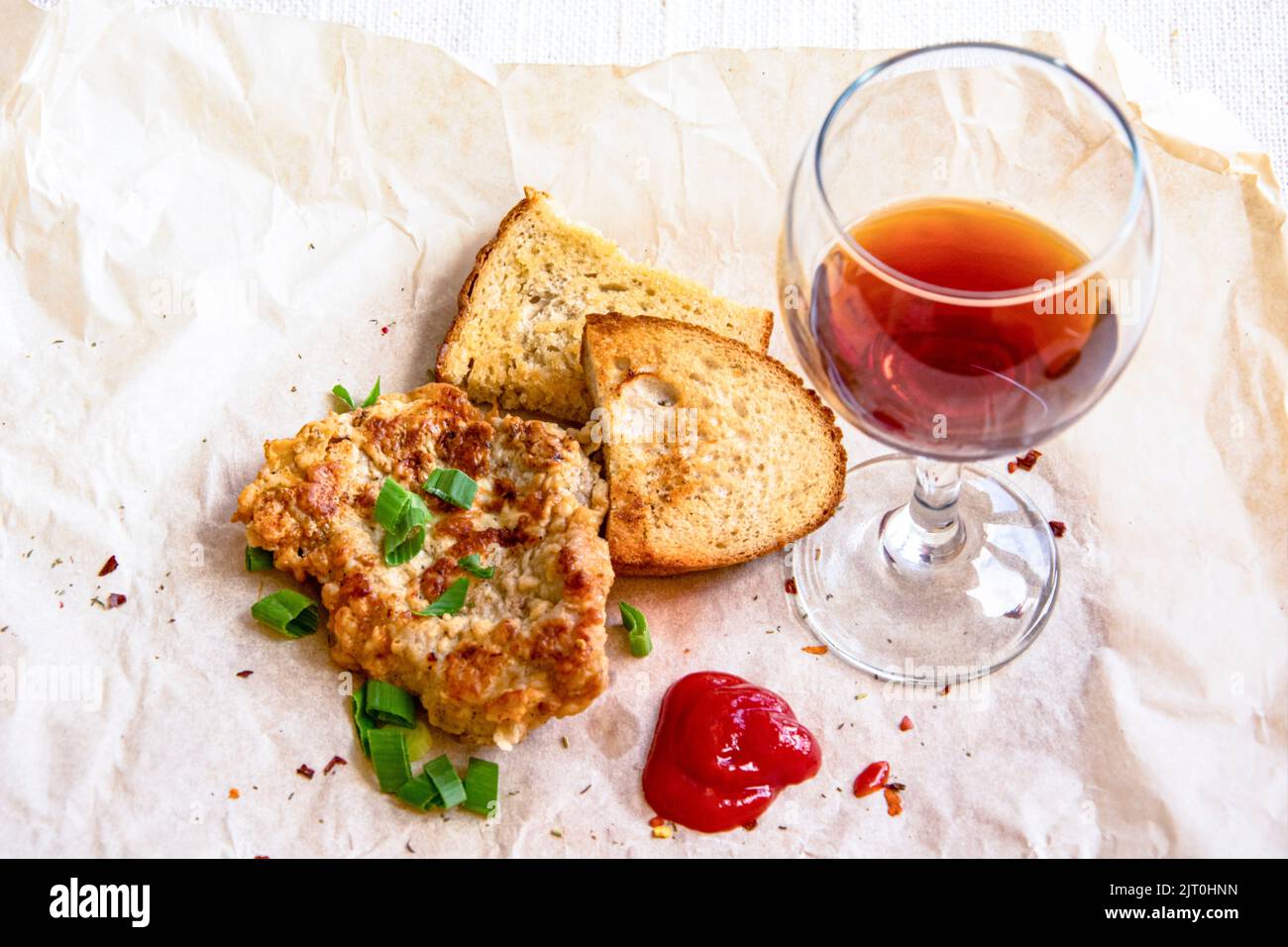 Fresh fried pork chops sprinkled with green onions and ketchup ...