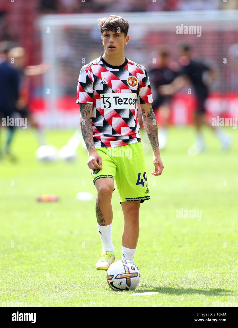 Manchester United's Alejandro Garnacho warms up ahead of the Premier ...