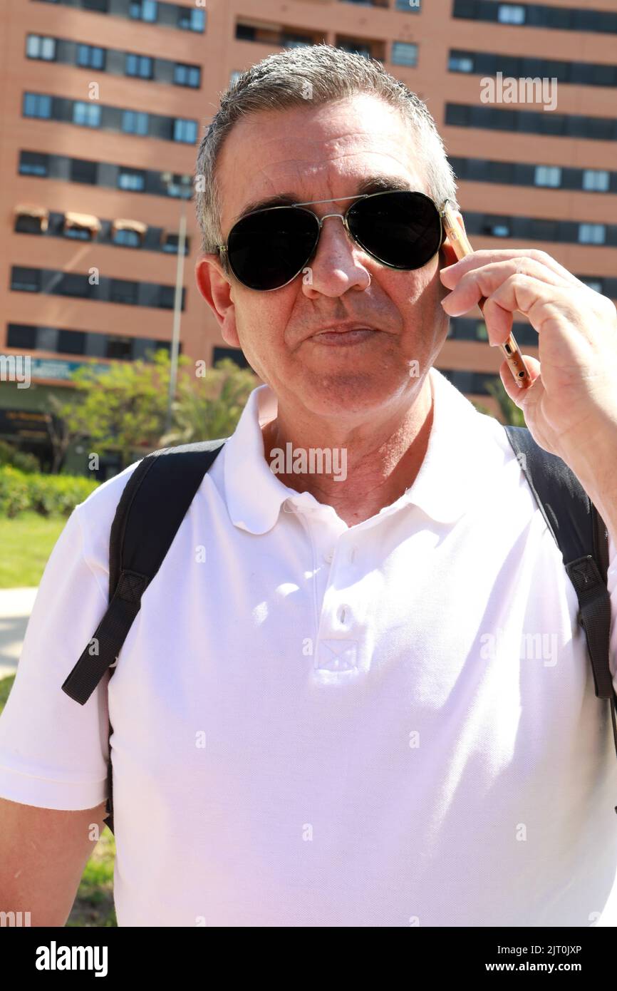 Old man talking to young person hi-res stock photography and images - Alamy