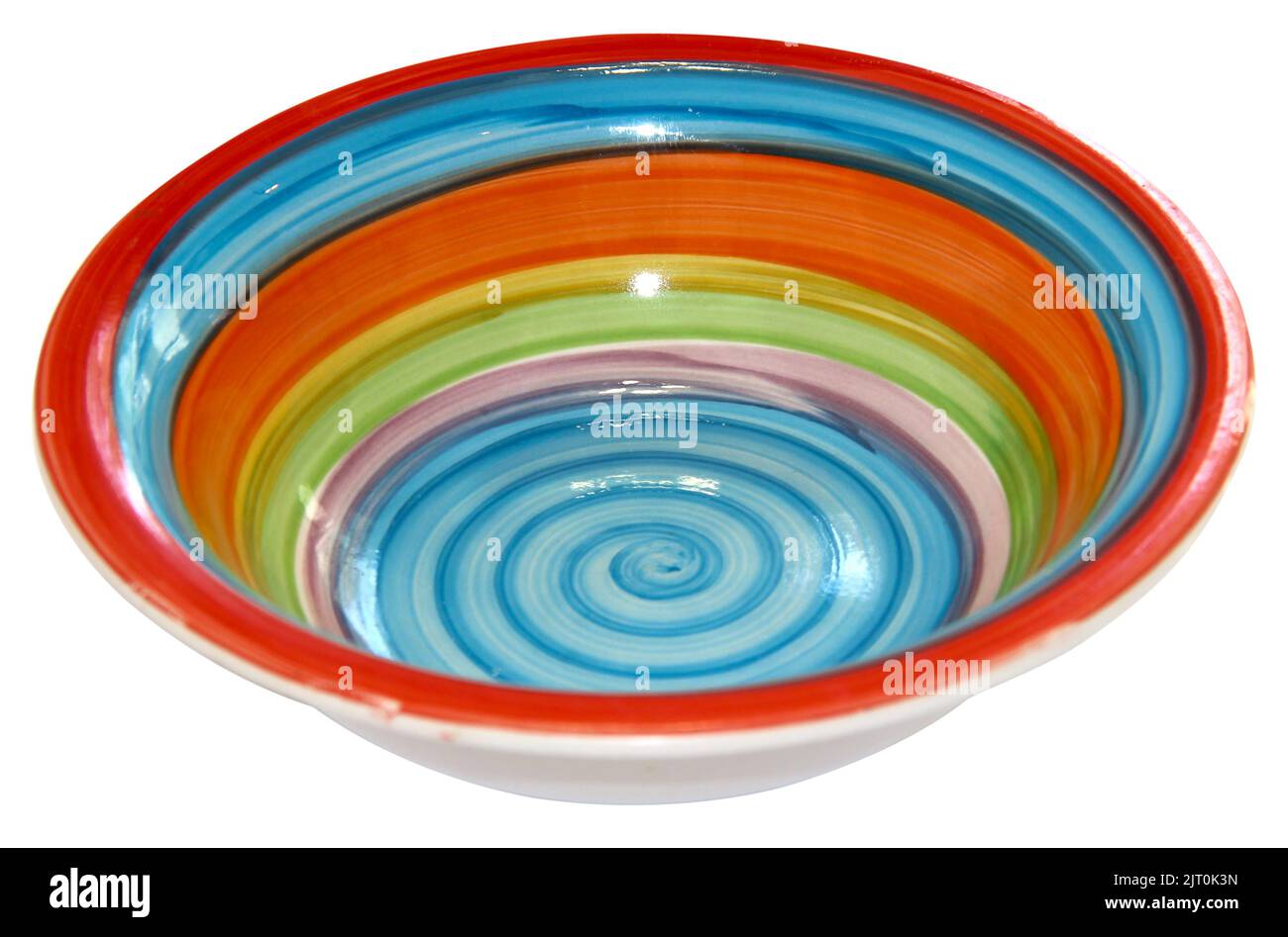 Bright deep dish with a spiral pattern isolated on white, side view ...