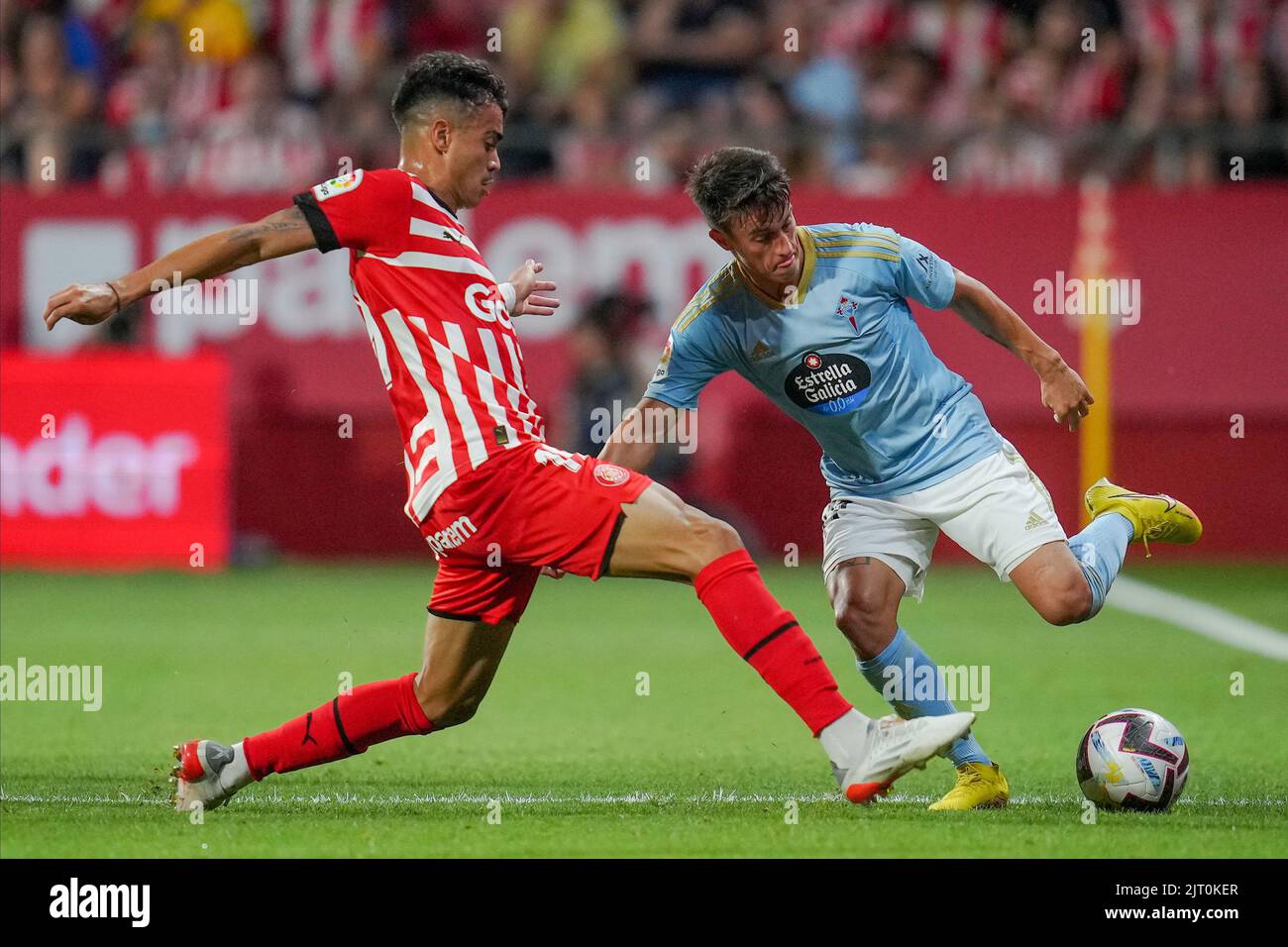 Franco Cervi of RC Celta and Jesus Reinier of Girona FC during the La ...